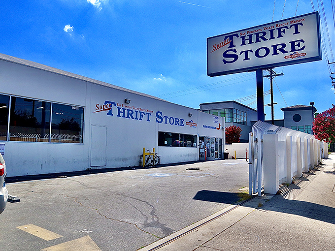 The unassuming exterior of Super Thrift Store beckons with its classic blue signage&mdash;proof that treasure hunting doesn't require a fancy storefront.