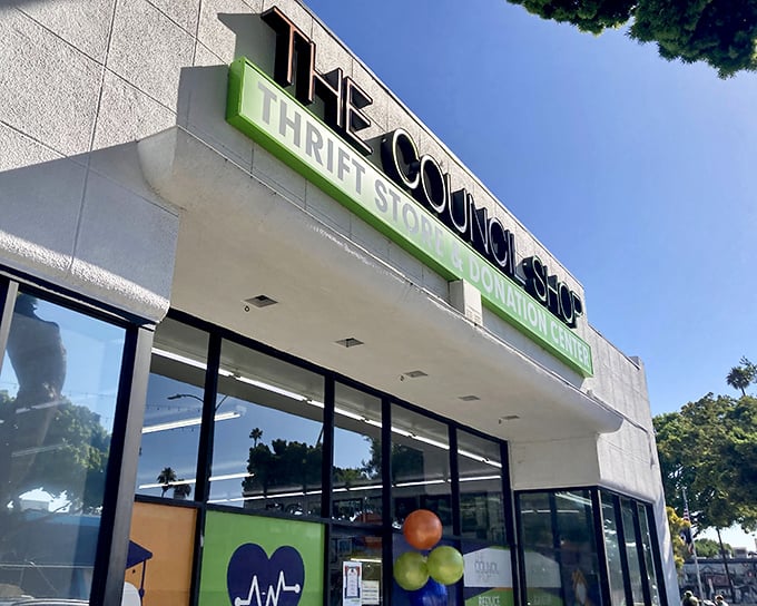 The Council Shop's unassuming exterior hides a treasure trove within—like finding a secret portal to bargain heaven on Venice Boulevard.