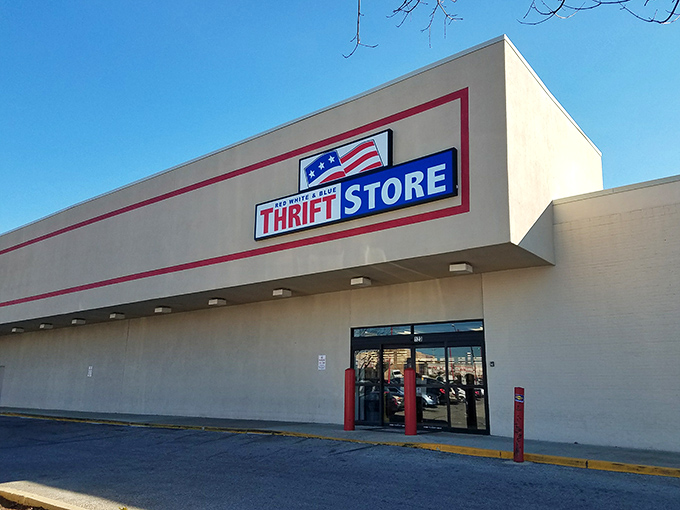 The unassuming exterior of Red White & Blue Thrift Store &ndash; like a humble librarian who secretly knows how to wrestle alligators.