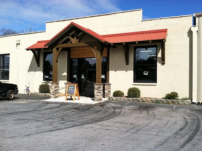 The iconic brown lettering against cream-colored brick promises treasure hunting adventures that would make Indiana Jones trade his whip for a shopping cart.
