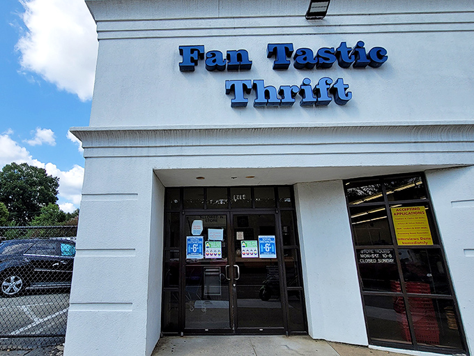 The blue signage against the white building is like a beacon for bargain hunters&mdash;Fan Tastic Thrift's exterior promises treasures within for the patient explorer.