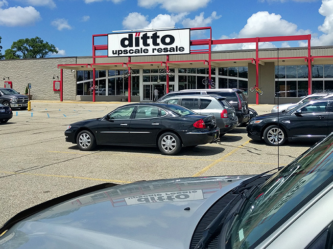 The red-trimmed facade of Ditto Upscale Resale stands like a beacon for bargain hunters. Michigan's temple of thrift beckons with promises of treasures within.
