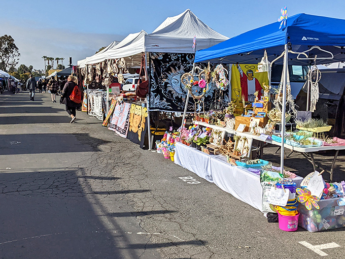 Treasure hunters navigate rows of colorful vendor tents at Kobey's, where one person's castoffs become another's prized possessions. 
