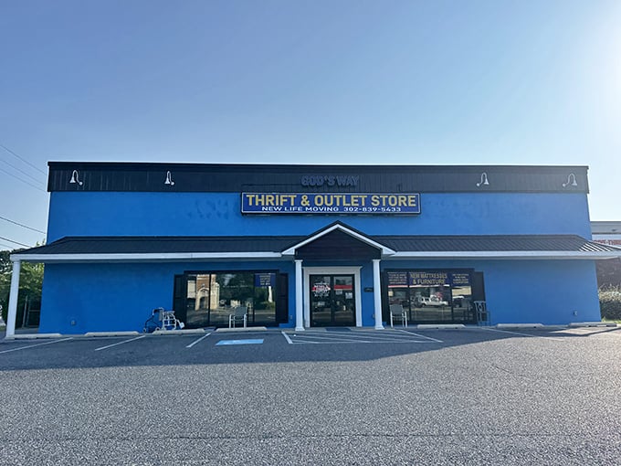 The bright blue exterior of God's Way stands like a beacon of bargain hope on Coastal Highway. Thrift paradise awaits inside!