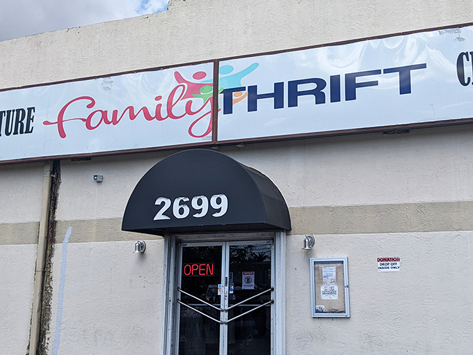 The unassuming exterior of Family Thrift Store in Lauderdale Lakes &ndash; where treasure hunting begins beneath Florida's sunny skies.