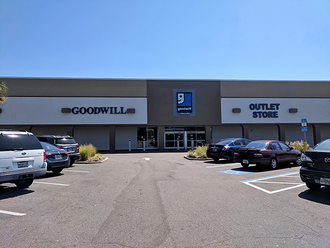 The unassuming exterior of Goodwill's Taft Outlet in Orlando hides a treasure trove within, like a poker player with a royal flush keeping a straight face.