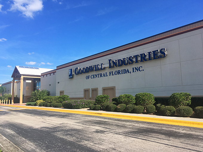 The unassuming exterior of Goodwill Industries of Central Florida belies the treasure trove waiting inside. Florida's palm trees stand guard over this bargain hunter's paradise.