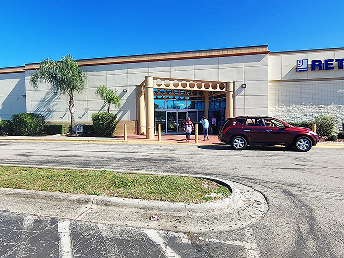 The unassuming exterior of Goodwill Industries of Central Florida belies the treasure trove waiting inside. Florida's palm trees stand guard over this bargain hunter's paradise.