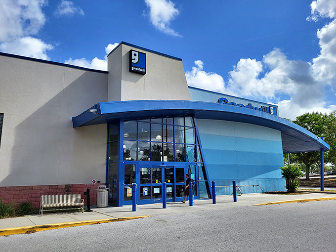 Modern retail architecture meets thrift store magic, where bargain hunters park their chariots for treasure hunting adventures.
