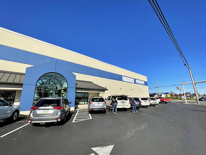 The bright blue exterior of Re-Uzit Shop stands out like a bargain hunter's beacon against the Pennsylvania sky, drawing thrift enthusiasts from miles around.
