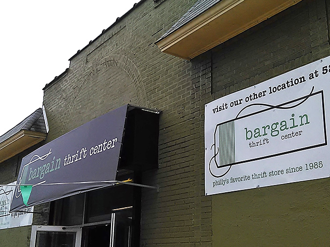 The iconic green and black storefront of Bargain Thrift Center beckons with promises of treasures waiting to be discovered inside.