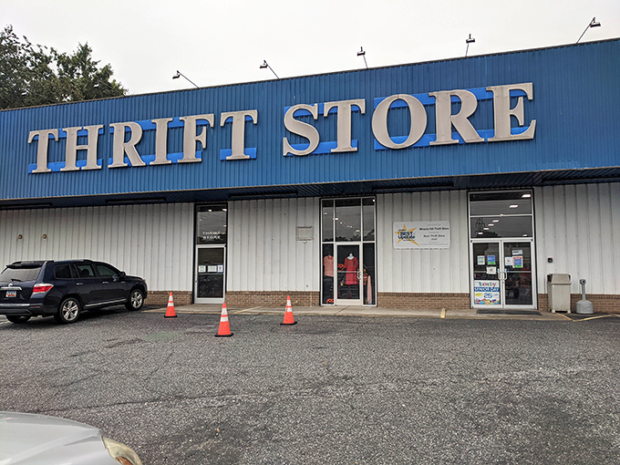 The iconic blue facade of Miracle Hill Thrift Store stands like a beacon of bargain possibilities on Wade Hampton Boulevard.