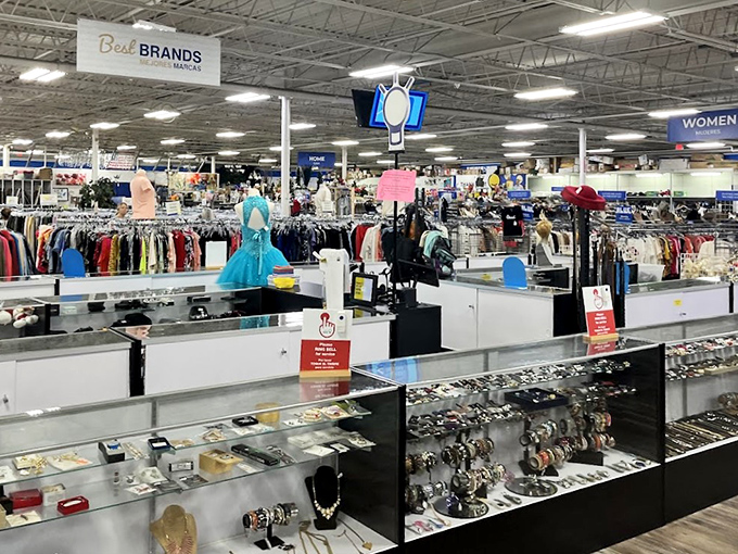ThriftSmart's expansive layout feels like a treasure map waiting to be explored. Blue signs overhead guide your adventure through this bargain wonderland.