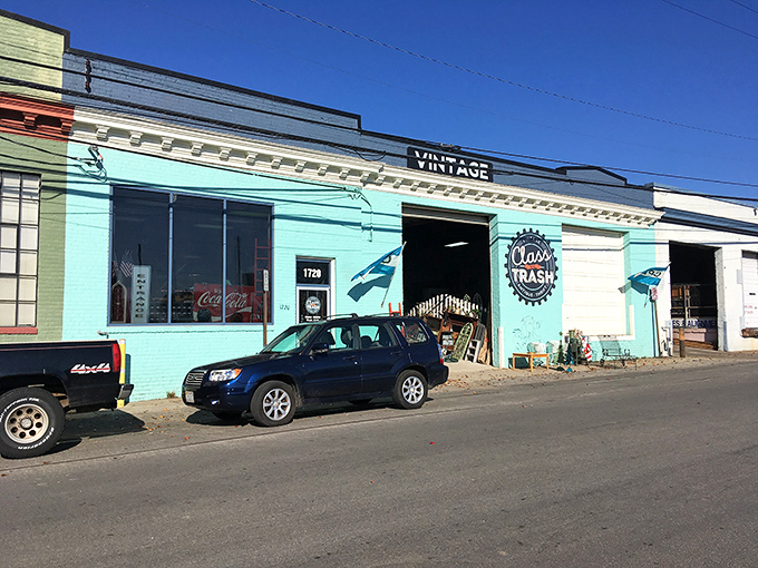 The turquoise facade of Class and Trash stands out in Scott's Addition like a peacock at a pigeon convention, beckoning vintage hunters inside.