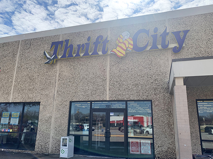 The iconic blue Thrift City sign beckons bargain hunters like a lighthouse for the frugally fashionable. Treasure awaits inside! 