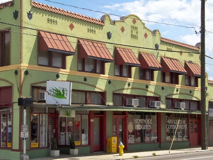 The historic Spanish-influenced fa&ccedil;ade of Retro Mania Vintage Market stands as a time capsule on Tampa's streets, copper awnings telling stories of decades past.