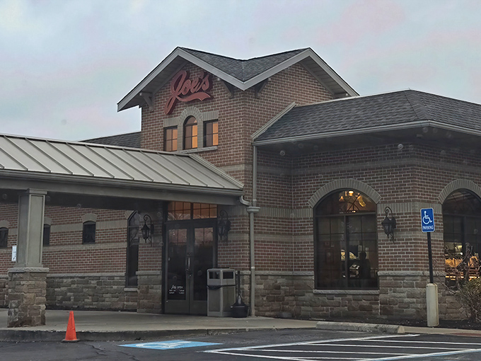 That red script sign might as well say "happiness lives here" &ndash; and it wouldn't be lying.