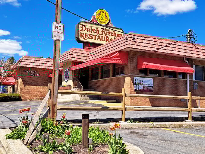 The iconic red-roofed Dutch Kitchen stands like a time capsule along Route 61, promising comfort food that predates food influencers and their ring lights.