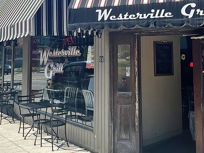 The classic striped awning of Westerville Grill beckons like an old friend promising comfort food and conversation in equal measure.