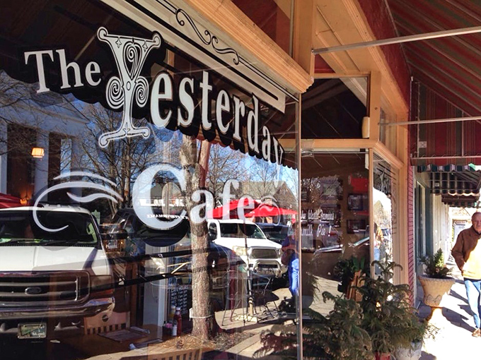 The classic red brick and striped awning exterior isn't just charming&mdash;it's the gateway to buttermilk pie paradise. Small-town America at its most delicious.