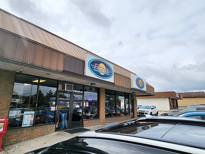 Fitzy's unassuming strip mall exterior is like that friend who doesn't brag but always delivers. Classic diner signage promises comfort food treasures waiting inside.