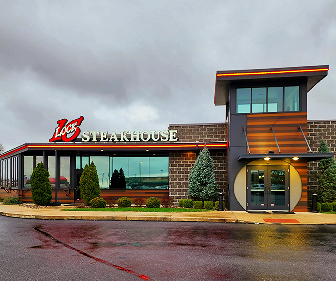 The modern brick exterior of Lock Sixteen Steakhouse stands ready to welcome hungry travelers, like a beacon of hope for empty stomachs on the Ohio horizon.