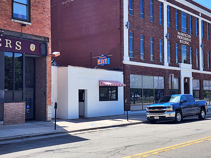 The unassuming white exterior of Al's Hamburger in downtown Green Bay might not scream "culinary landmark," but locals know better. This modest storefront has been satisfying hungry Wisconsinites for generations.