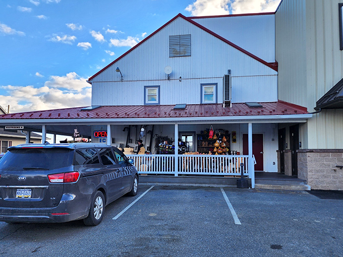 The unassuming white building with its red roof might not look like food paradise, but locals know this humble exterior hides culinary treasures within.
