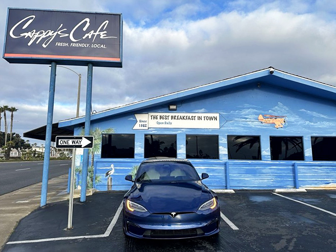 The bright blue beacon of breakfast bliss stands proudly along PCH, promising "the best breakfast in town" &ndash; a bold claim that generations of Newport locals will happily defend.