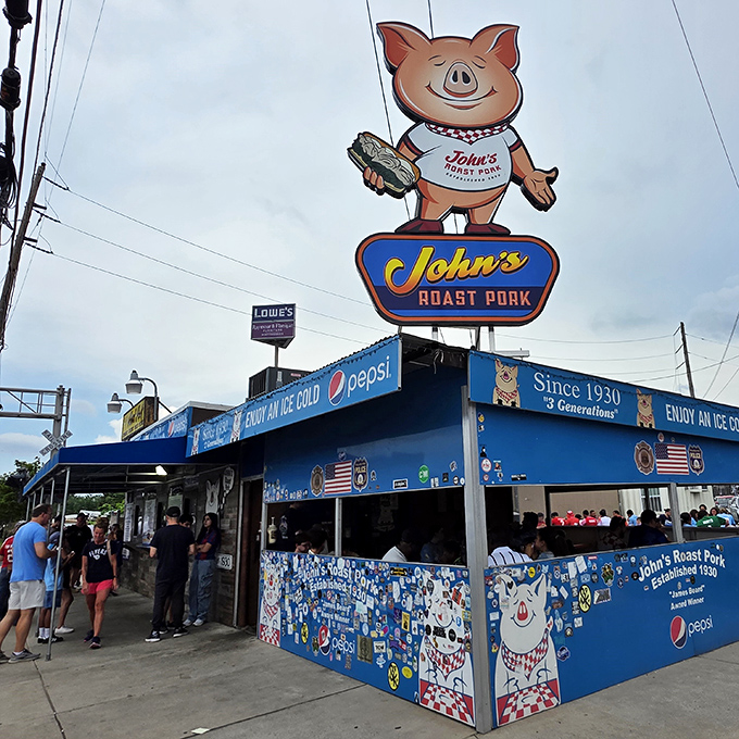 The iconic blue shack with its cheerful cartoon pig mascot stands as a beacon of sandwich excellence in South Philly. No fancy frills needed when the food is this legendary.