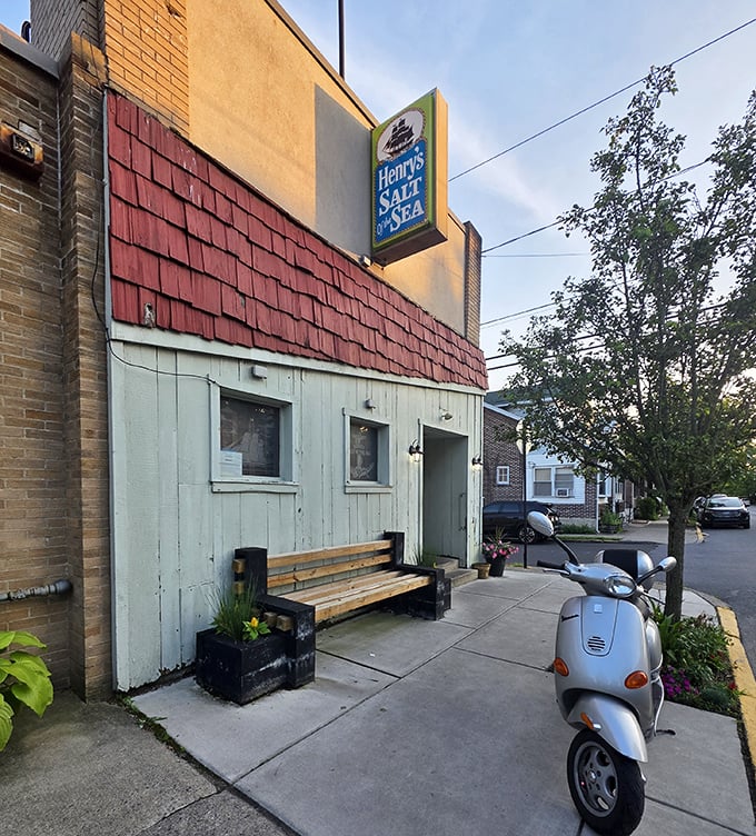 That weathered blue exterior whispers "come in" louder than any neon sign ever could.