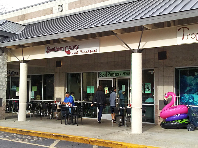 The unassuming storefront promises big flavor. That pink flamingo is just a hint of the personality waiting inside Southern Coney and Breakfast.