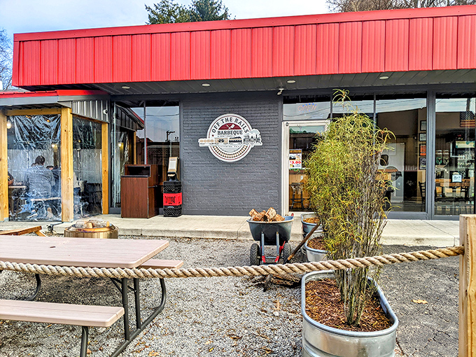 That red awning isn't just a design choice &ndash; it's a beacon calling hungry souls to smoky salvation.