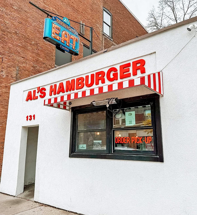 The unassuming white exterior of Al's Hamburger in downtown Green Bay might not scream "culinary landmark," but locals know better. This modest storefront has been satisfying hungry Wisconsinites for generations.