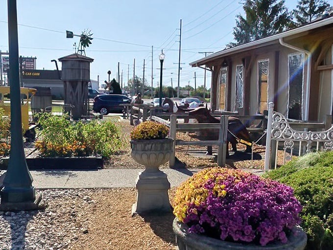 The iconic railroad crossing sign welcomes hungry travelers to Back 40 Junction, where Decatur's finest steaks await in this charming country-style building.