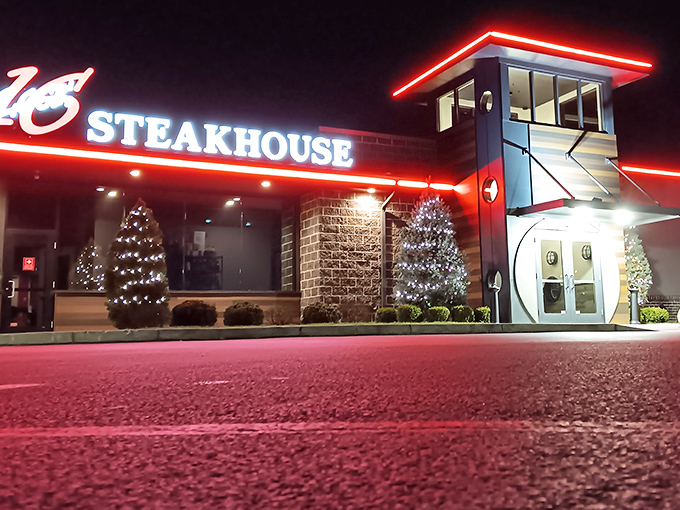 The modern facade of Lock Sixteen Steakhouse stands proudly in Elida, its distinctive red "16" logo beckoning hungry travelers like a culinary lighthouse.