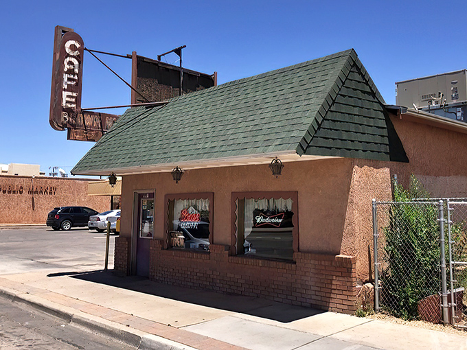 The pink stucco exterior of Brown Mug Cafe stands like a culinary oasis in Winslow, promising Mexican-American comfort food that transcends its humble appearance.