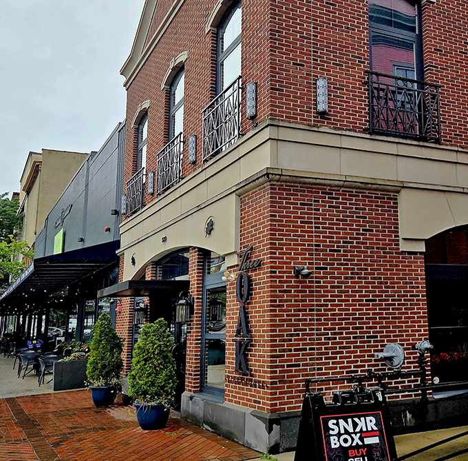 Three Oak Steakhouse stands proudly on its Easton corner, its classic brick fa&ccedil;ade promising culinary adventures within. The cobalt planters add just the right pop of color.