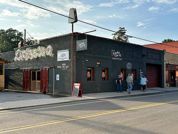 The unassuming black building with vibrant green lettering might not scream "food paradise," but locals know better. This LaFayette gem is worth the detour.