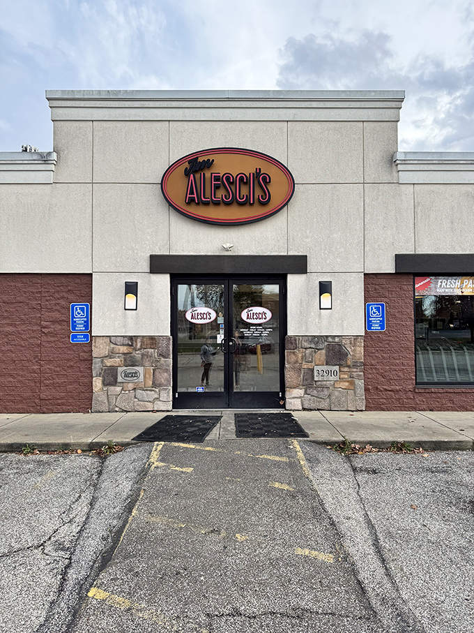 The unassuming exterior of Jim Alesci's Place in Solon hides culinary treasures within, like a delicious secret waiting to be discovered.