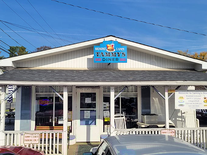 This charming white cottage with its welcoming porch practically begs you to come inside for breakfast.