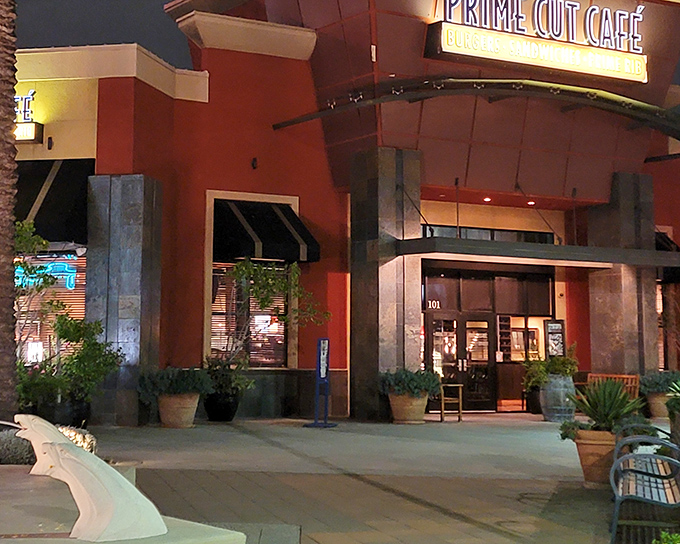 The terra cotta fa&ccedil;ade glows like a beacon for hungry souls, promising meaty salvation within those stylish doors. 