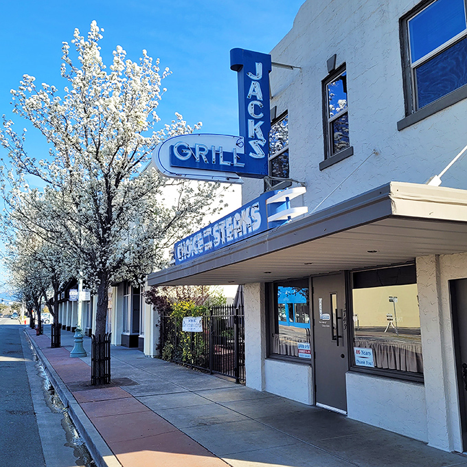 The iconic blue neon sign of Jack's Grill stands as a beacon of culinary tradition in Redding, promising carnivorous delights that have satisfied generations of Californians.