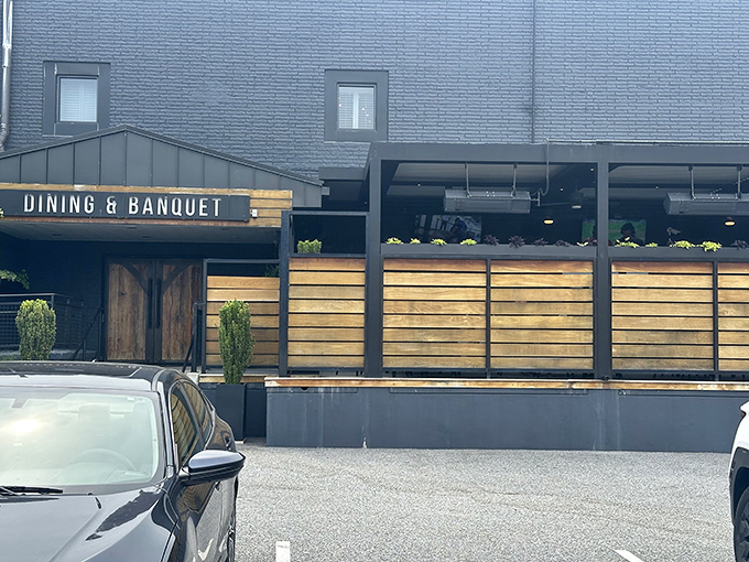 The iconic crab-topped sign beckons seafood pilgrims like a lighthouse for the hungry. Baltimore's culinary North Star has been guiding appetites for generations.