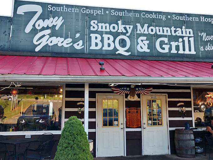 The flame-decorated signage isn't just for show&mdash;Tony Gore's red-roofed roadside haven delivers heat in both atmosphere and flavor.