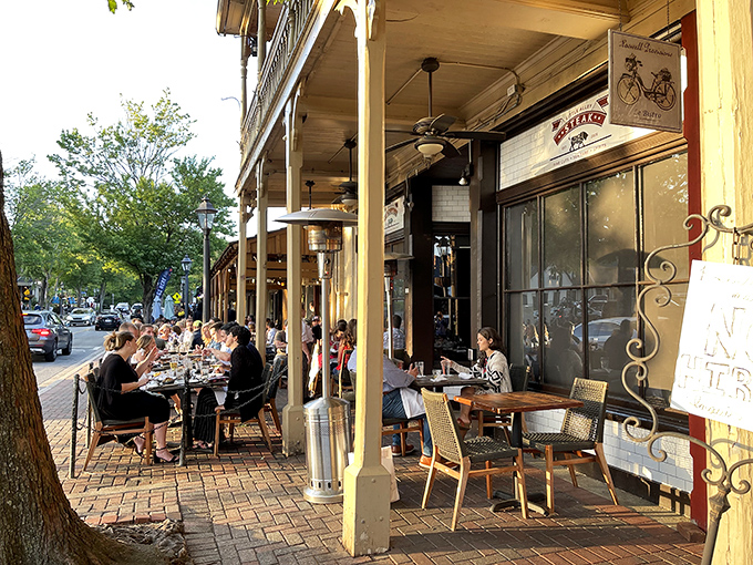 Historic charm meets culinary excellence on Canton Street. Little Alley Steakhouse's beautiful brick exterior and inviting porch beckon meat lovers to step inside and indulge.