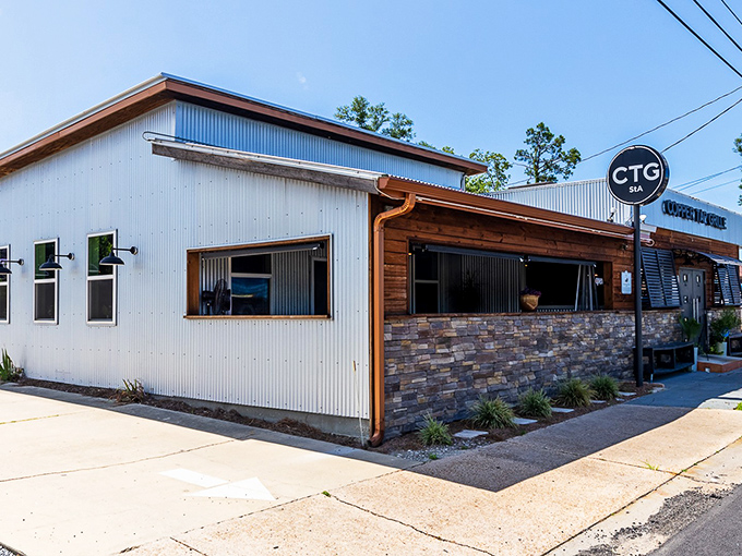The rustic-meets-modern exterior of Copper Tap Grille beckons with its corrugated metal, warm wood, and stone accents&mdash;architectural proof that the best flavors often hide in unassuming packages.