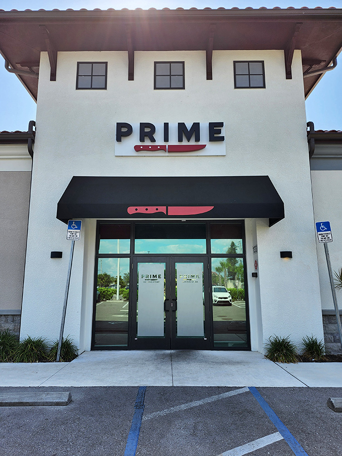 The striking white exterior with its bold red knife logo promises serious business when it comes to steak. This isn't a place that minces words&mdash;or meat.