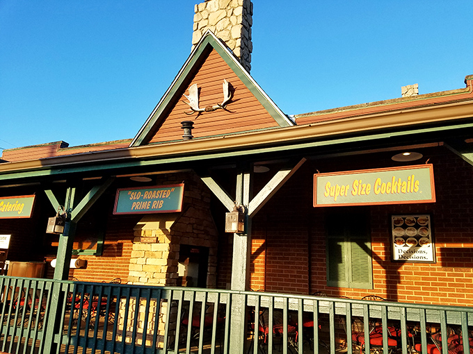 The rustic exterior of Timber Lodge promises woodland charm and serious steaks, with those "Super Size Cocktails" signs practically begging you to come inside.