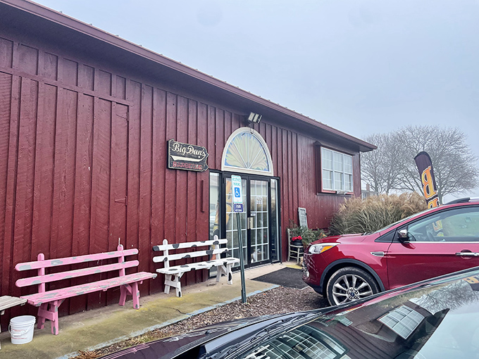 The rustic red exterior of Big Dan's BBQ promises no frills, just thrills for your taste buds. Country charm at its smokiest.